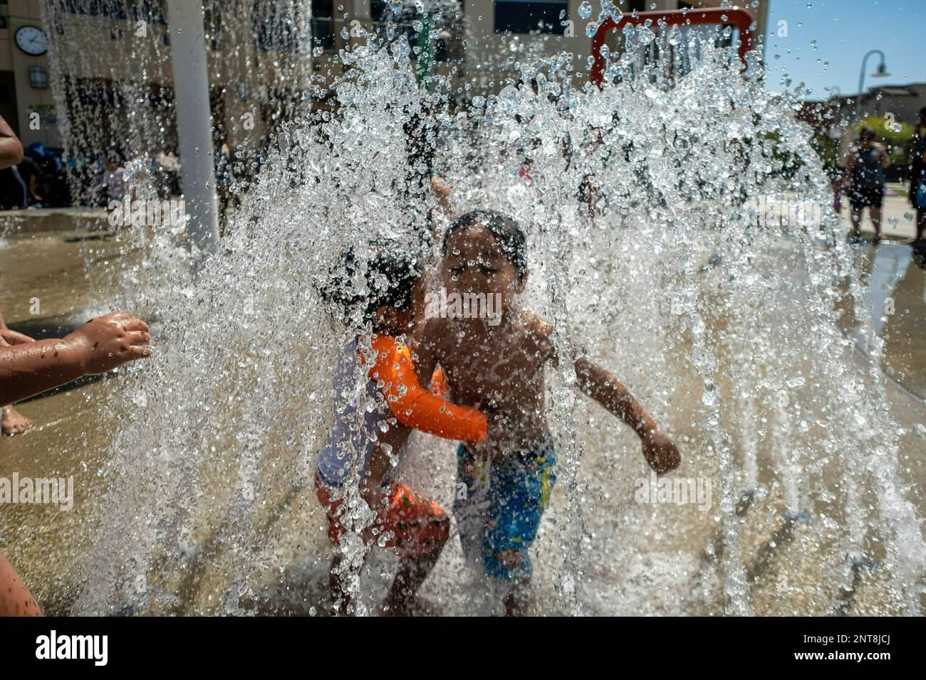 People cool off at the San Fernando Regional Pool in San Fernando, July ...