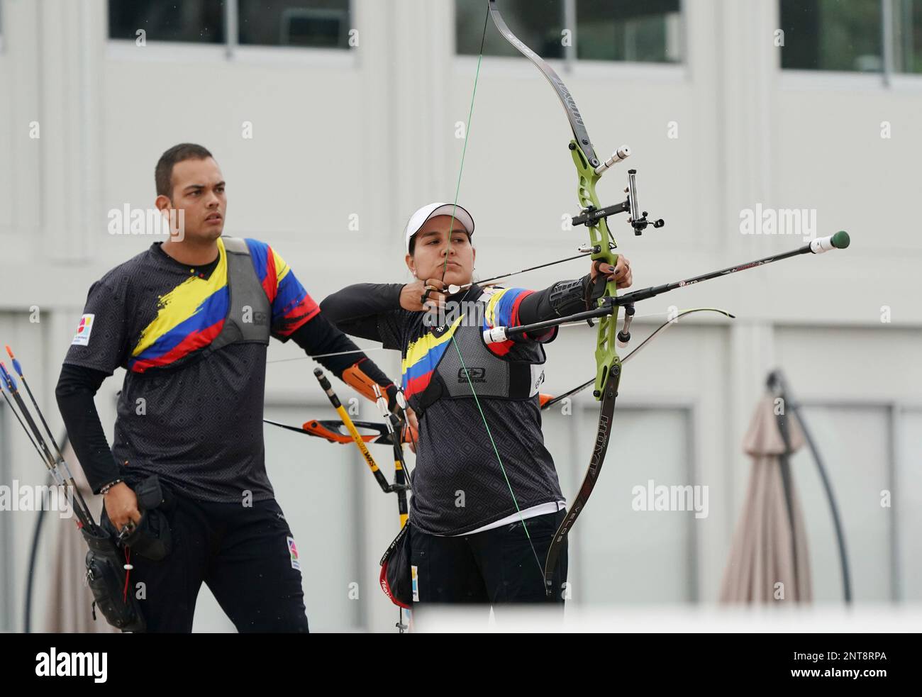 Ana Maria Rendon (F) and Daniel Felipe Pineda (M) of Colombia compete ...