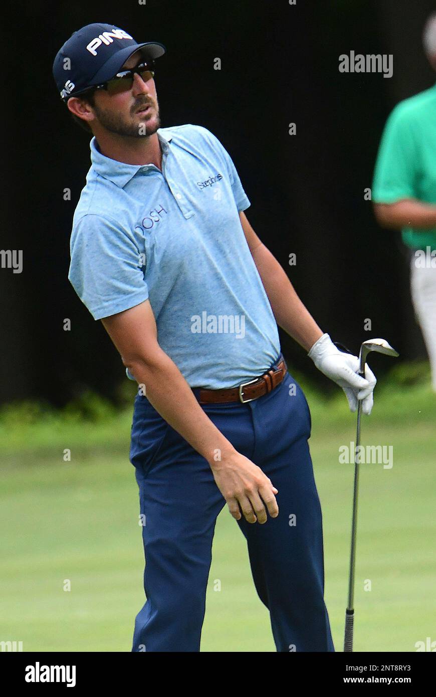 SILVIS, IL - JULY 13: Andrew Landry follows the progress of his ball ...