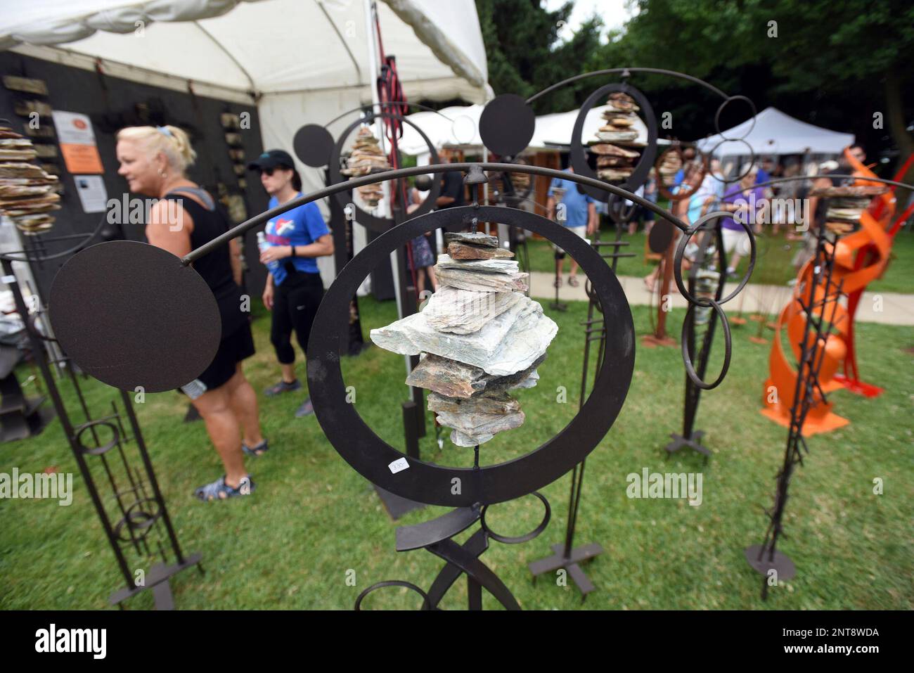 Sculptures by artist Cliff Matyszczyk, of Wales, WI, turn in the wind ...