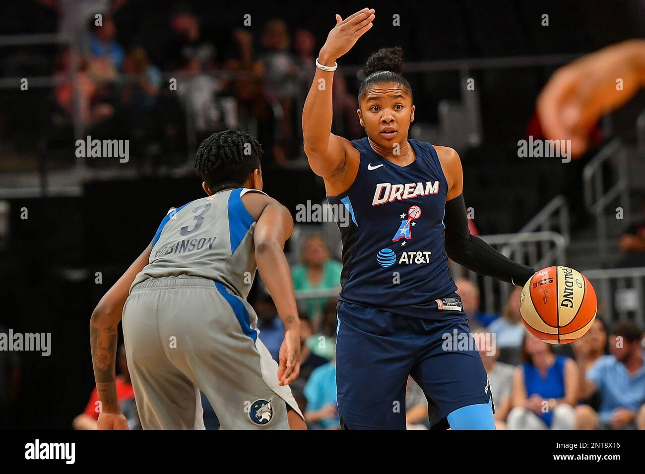 ATLANTA, GA – JULY 12: Atlanta's Alex Bentley (right) directs traffic ...