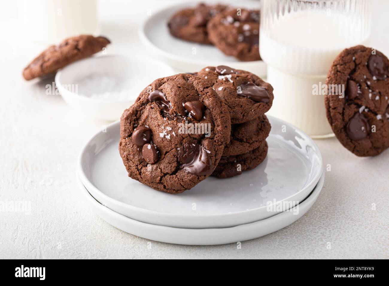 Double chocolate cookies with chocolate chips and flaky salt stacked on ...