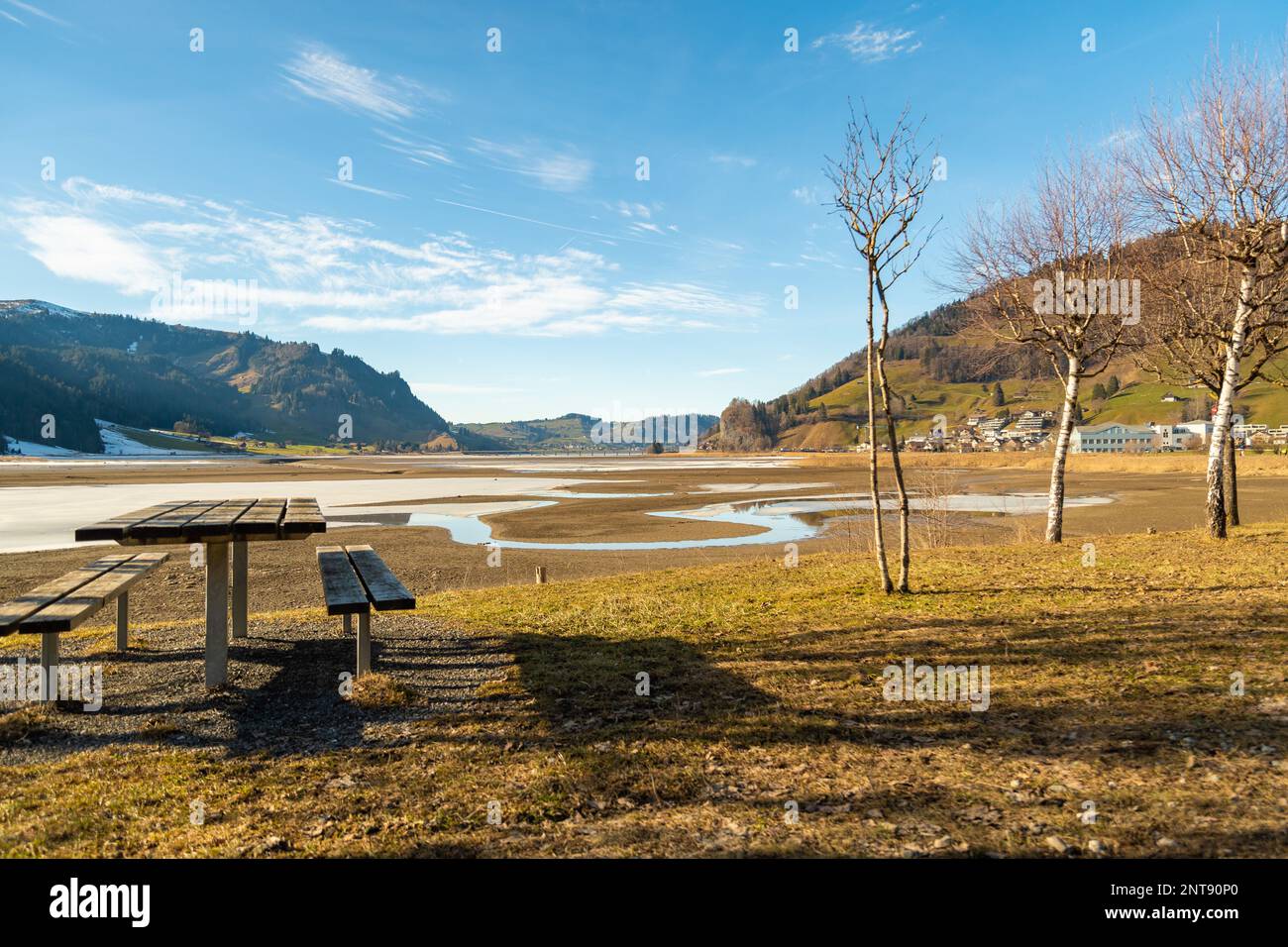 Einsiedeln area, Canton Schwyz, Switzerland, February 20, 2023 Waterfront at the lake Sihlsee in ...