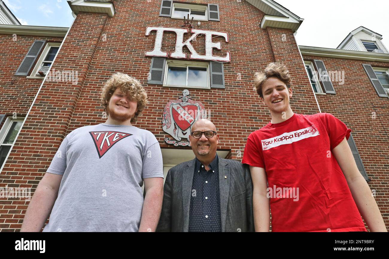 Tony Caccomo, center, talks with TKE members Greg Marshall, left and ...