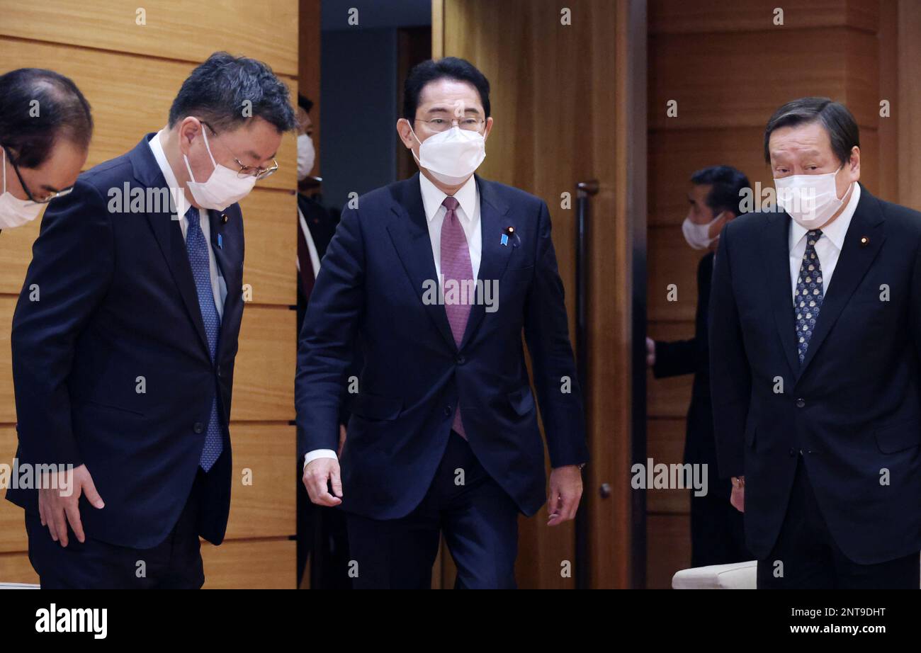 Japanese Prime Minister Fumio Kishida (C) attends a cabinet meeting at ...