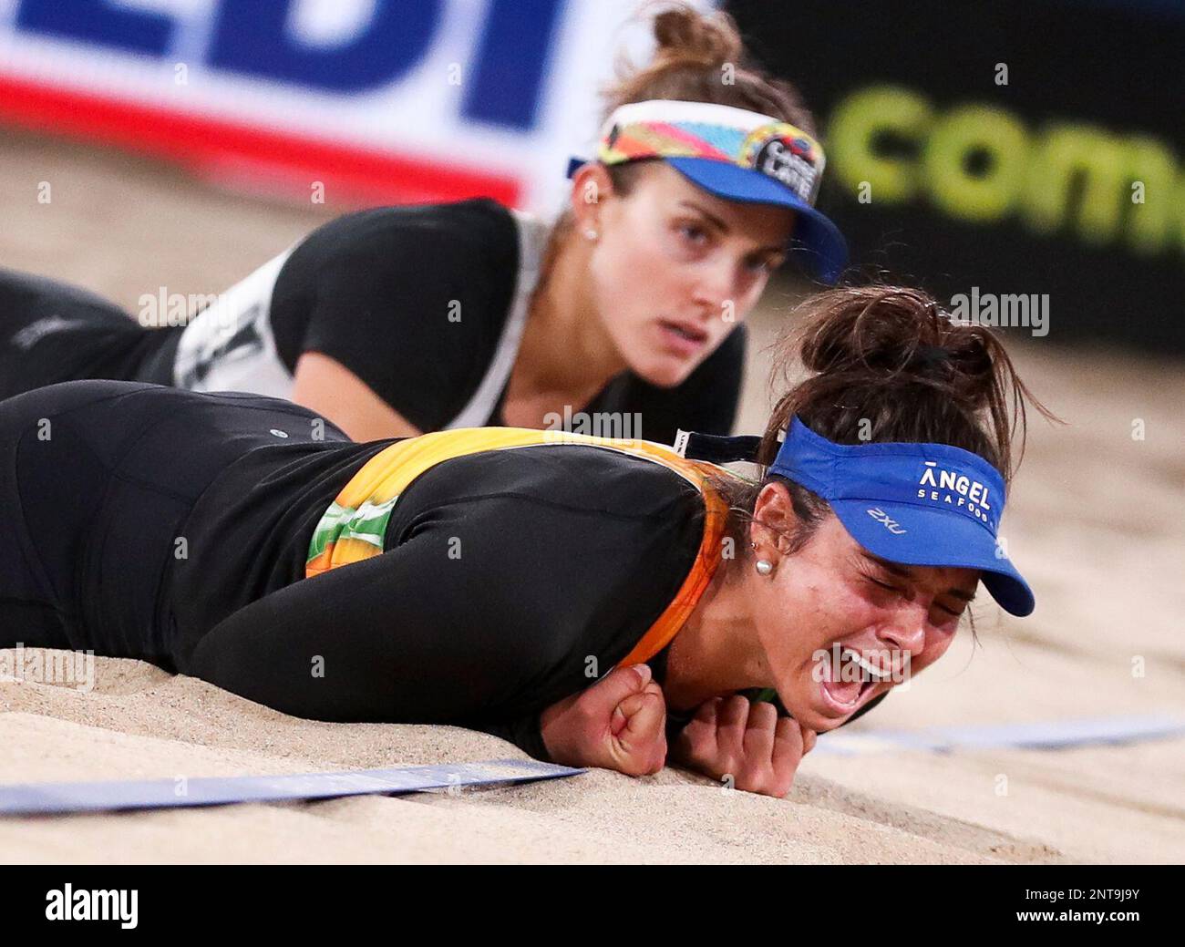 Australia's Mariafe Artacho lays in front of Switzerland's Nina ...