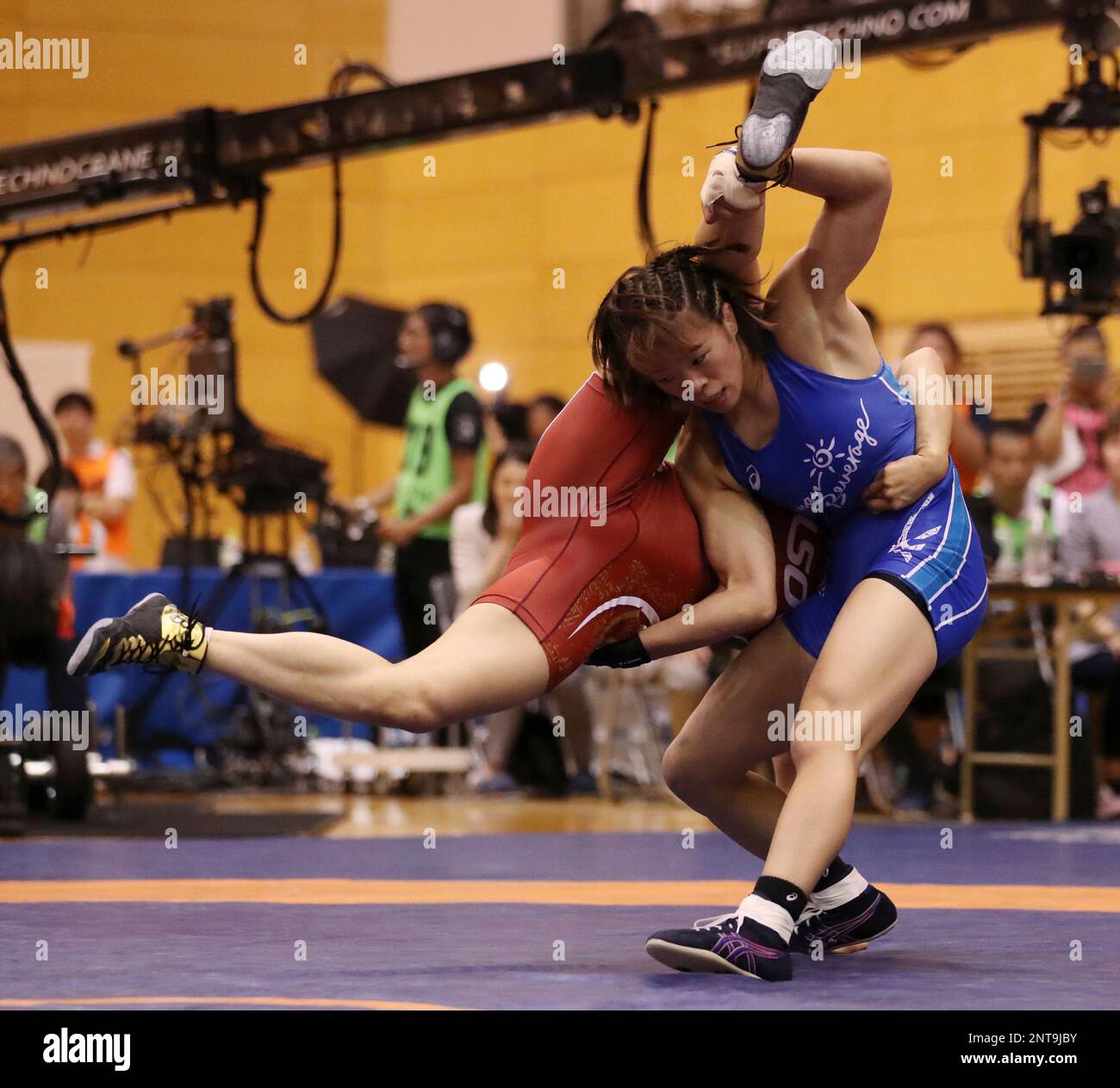 Japan's four-time Olympic wrestling champion Kaori Icho (red) competes ...