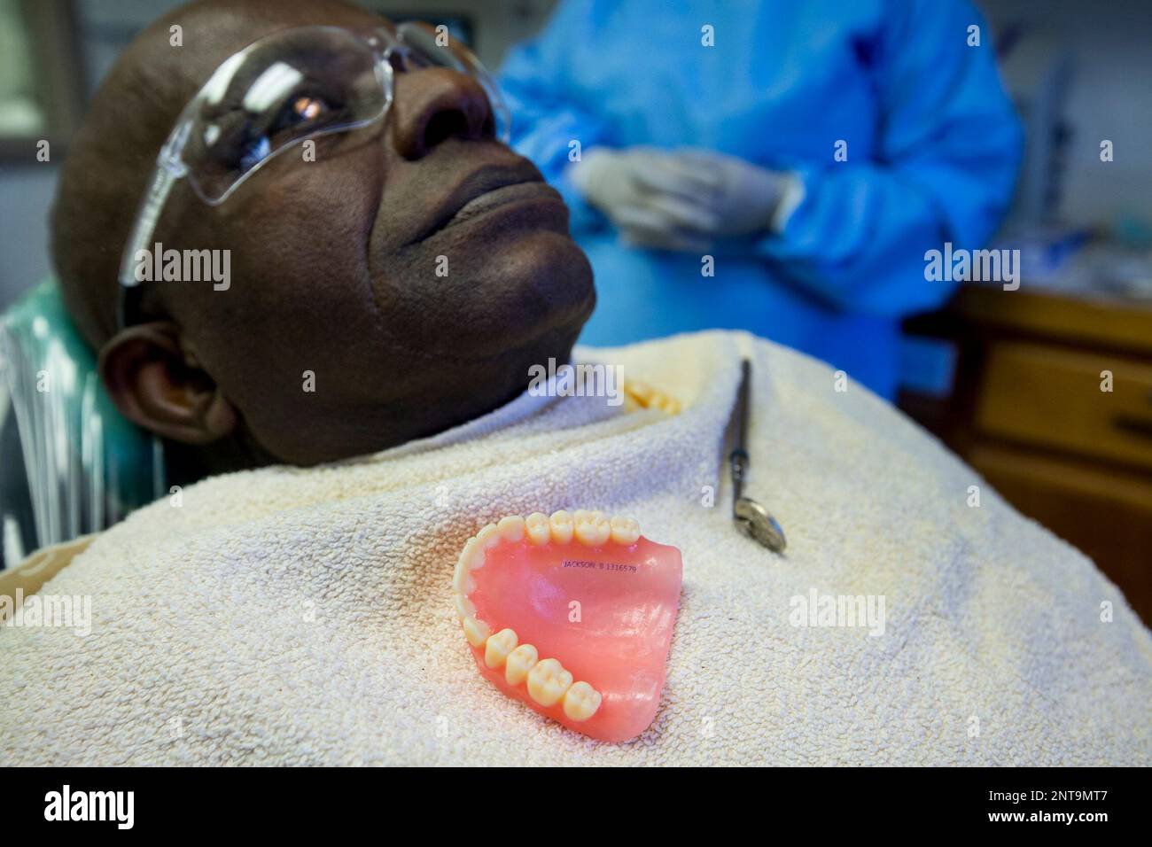 Beazley Jackson sits in the dental chair as he is fitted for new 3D ...