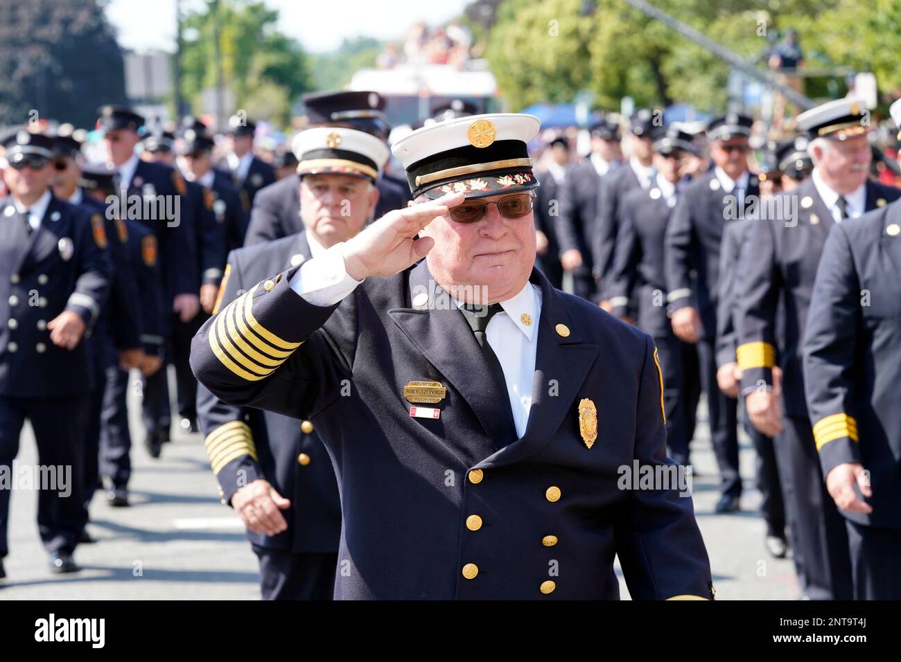 Pittsfield Fire Chief Robert Czerwinski salutes the reviewing stand ...