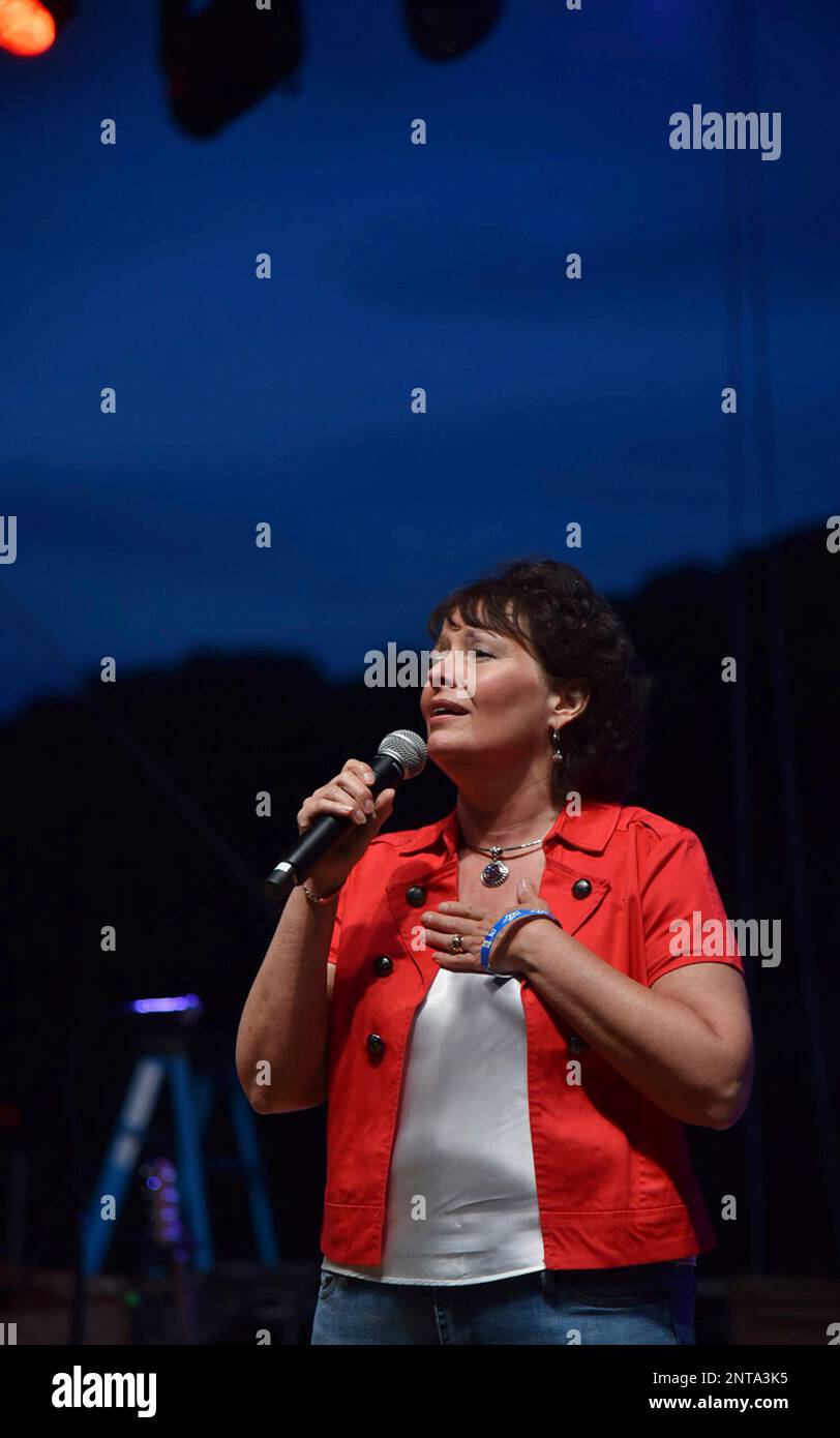 Nancy Banfield sings the national anthem on Tuesday, July 2, 2019, at ...