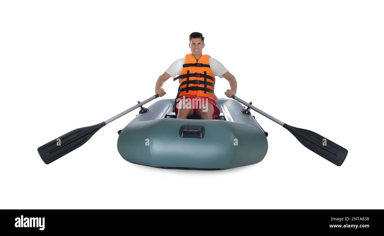 Man in life vest rowing inflatable rubber boat on white background ...