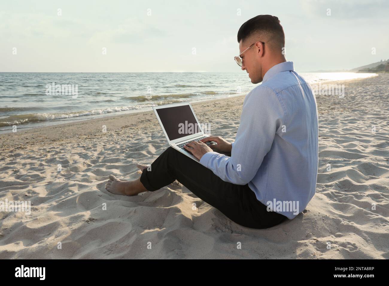 Businessman working success beach vacation hi-res stock photography and ...