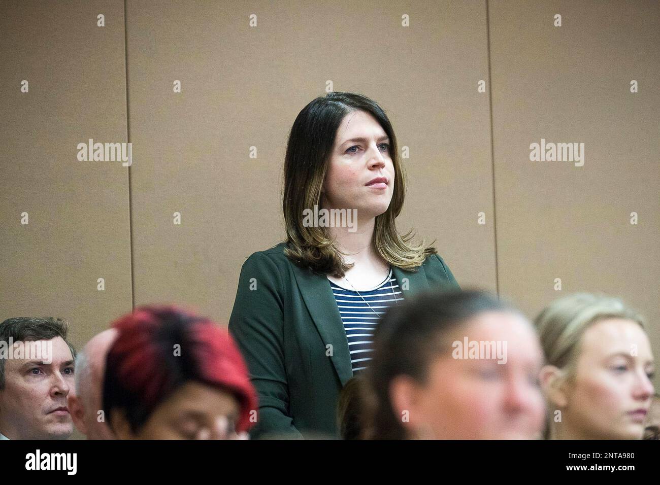 Jenna Garland, center, former spokeswoman for Atlanta Mayor Kasim Reed ...