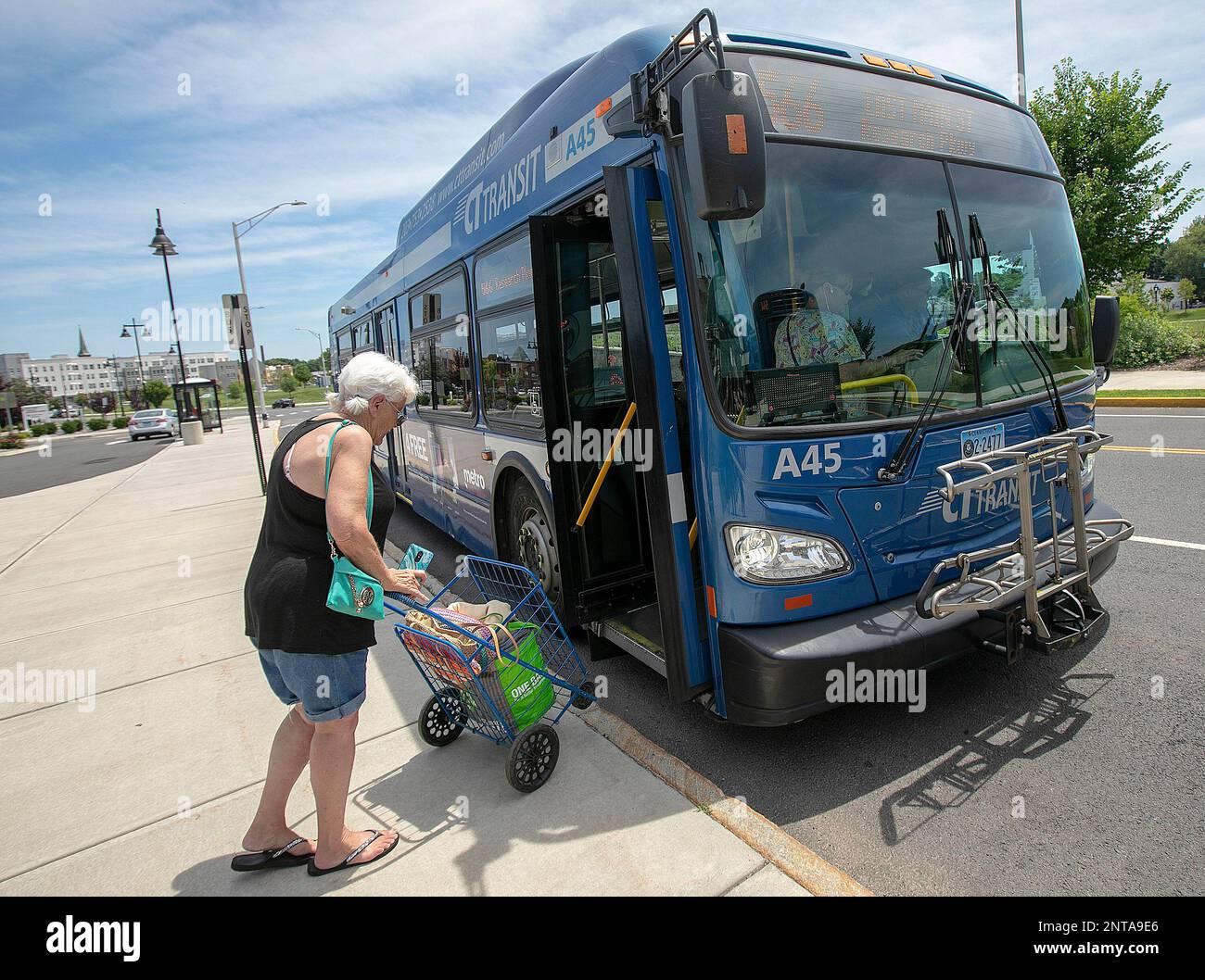 In this Friday, June 28, 2019 photo, Cathy Hill, of Middletown, boards ...