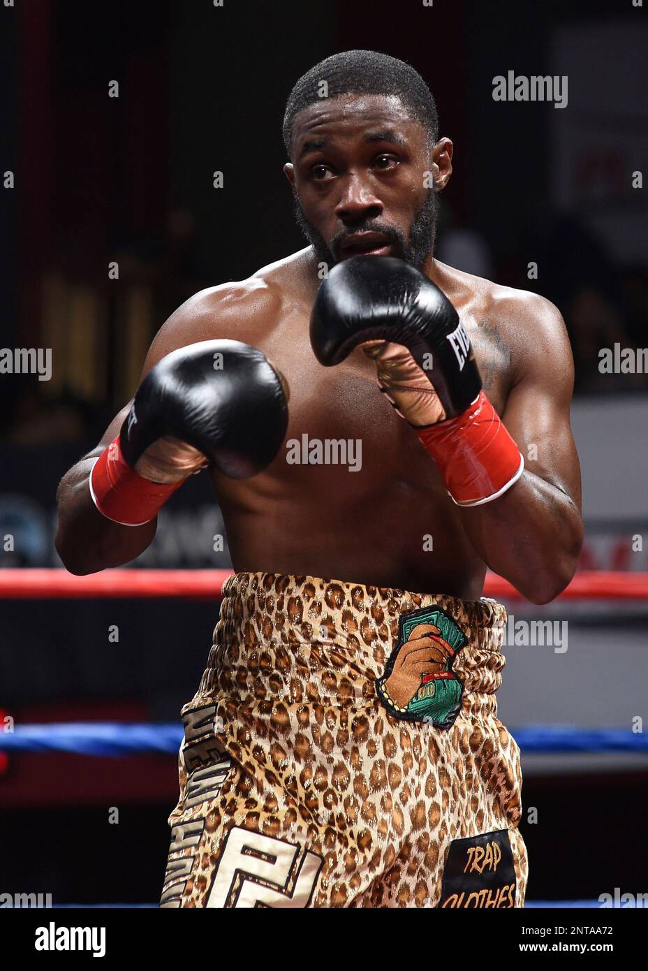 MASHANTUCKET, CT - JUNE 29: Tramaine Williams (red tape) takes on Neil ...