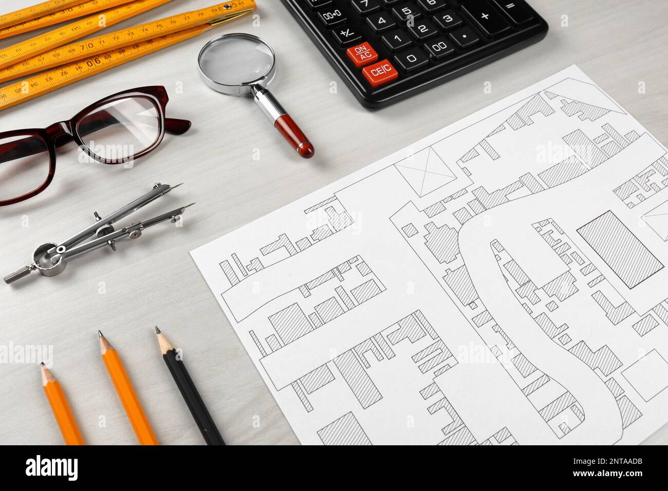 Office stationery and cadastral map of territory with buildings on ...