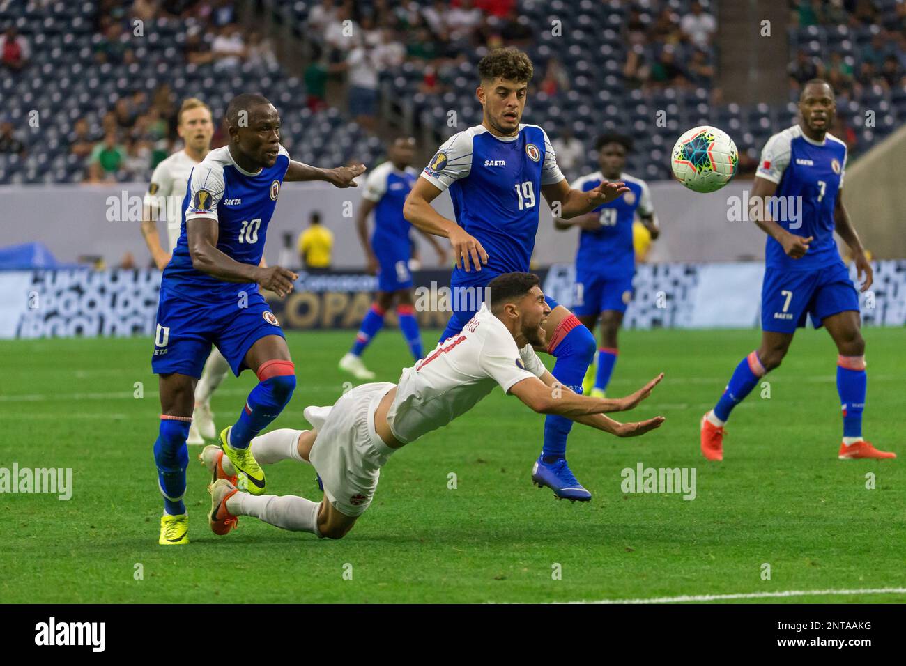 HOUSTON, TX - JUNE 29: Wilde-Donald Guerrier (10) of Haiti and Steeven ...