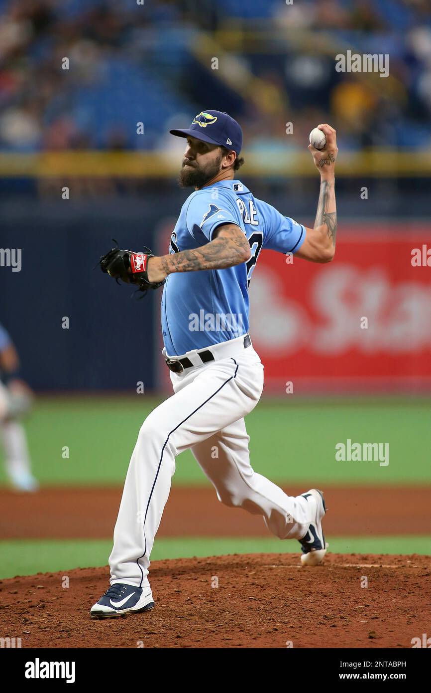 ST. PETERSBURG, FL - JUN 30: Chaz Roe (52) of the Rays delivers a pitch ...