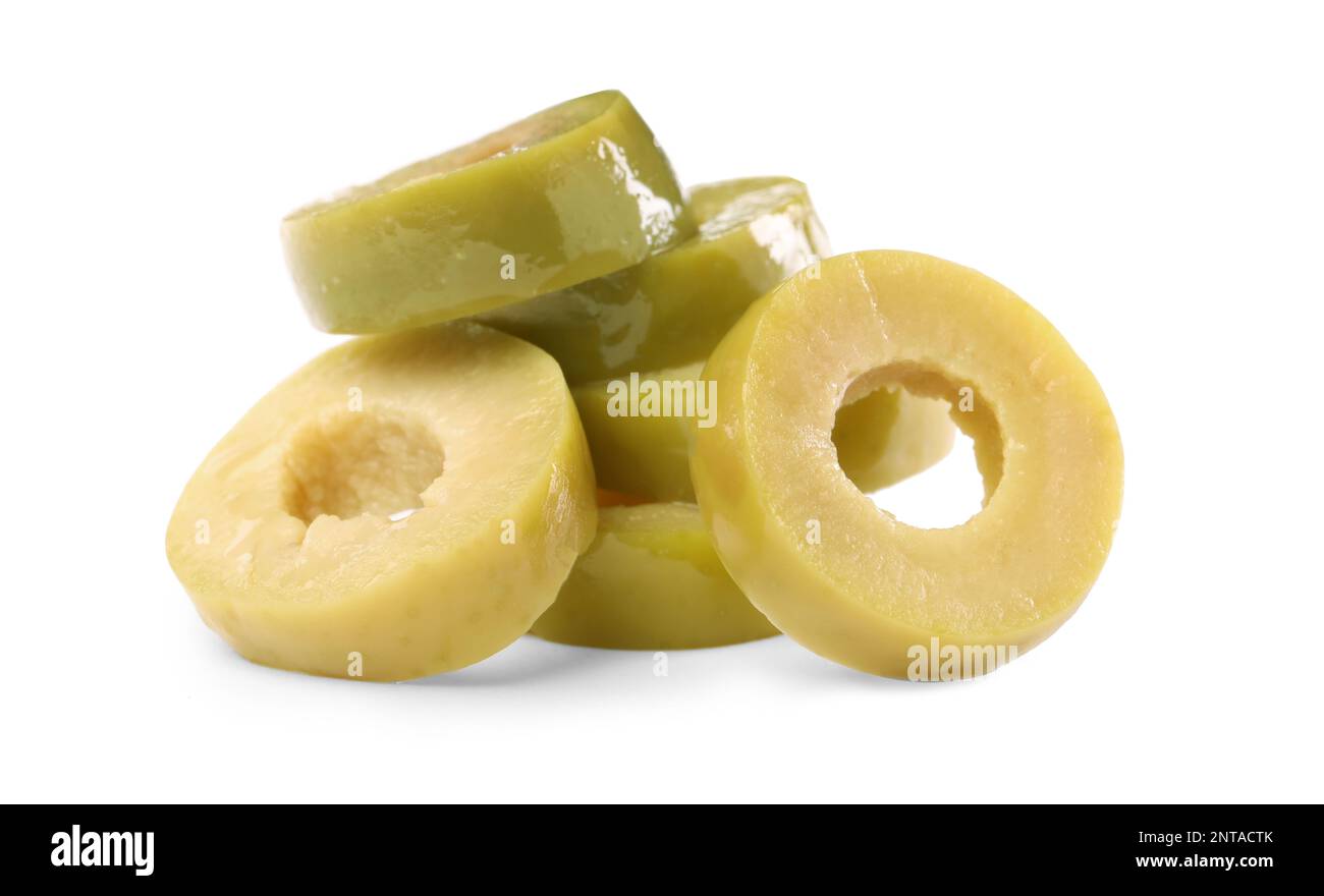Cut fresh green olives on white background Stock Photo - Alamy