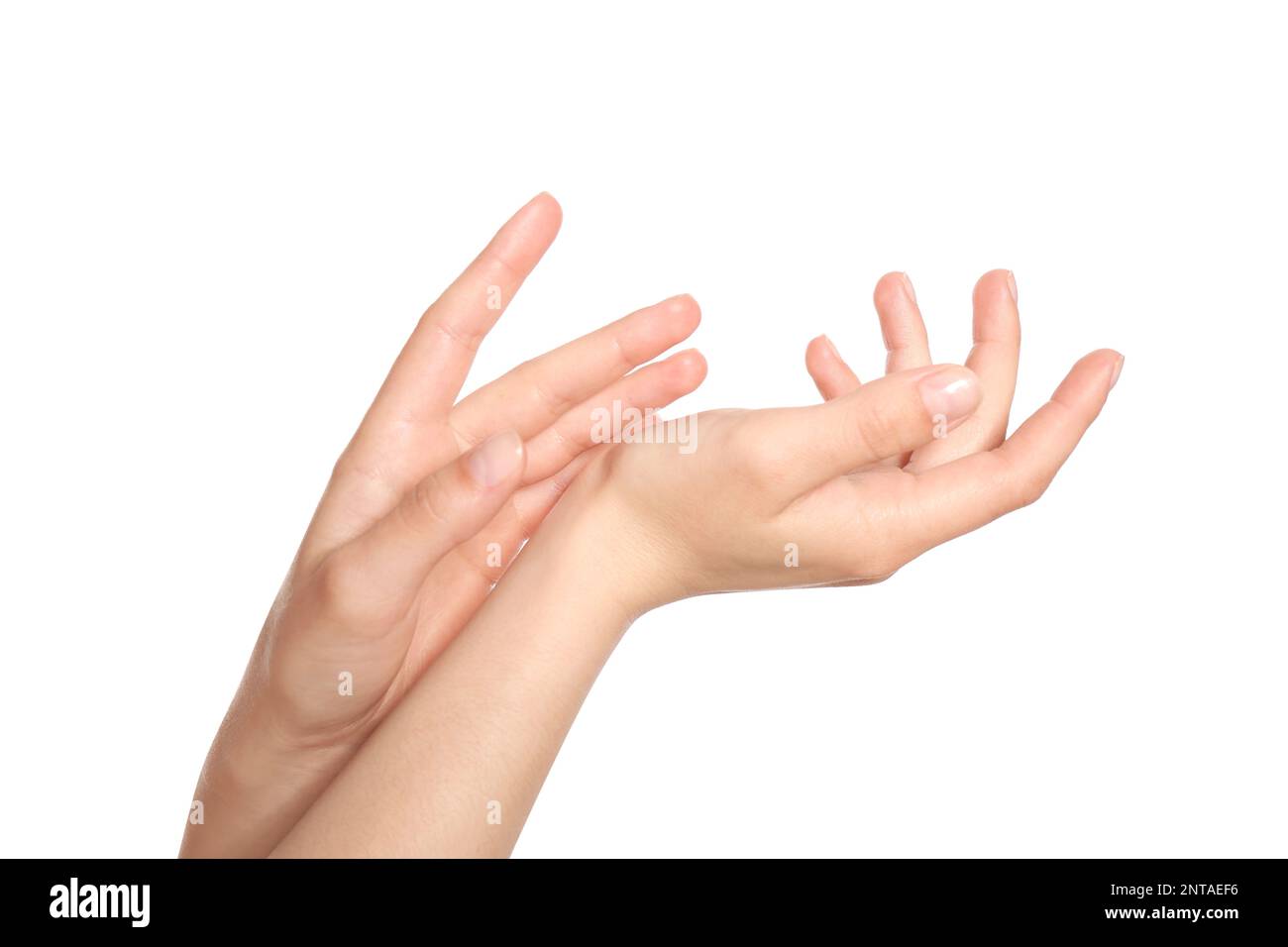 Woman hands applying oil Cut Out Stock Images & Pictures - Alamy