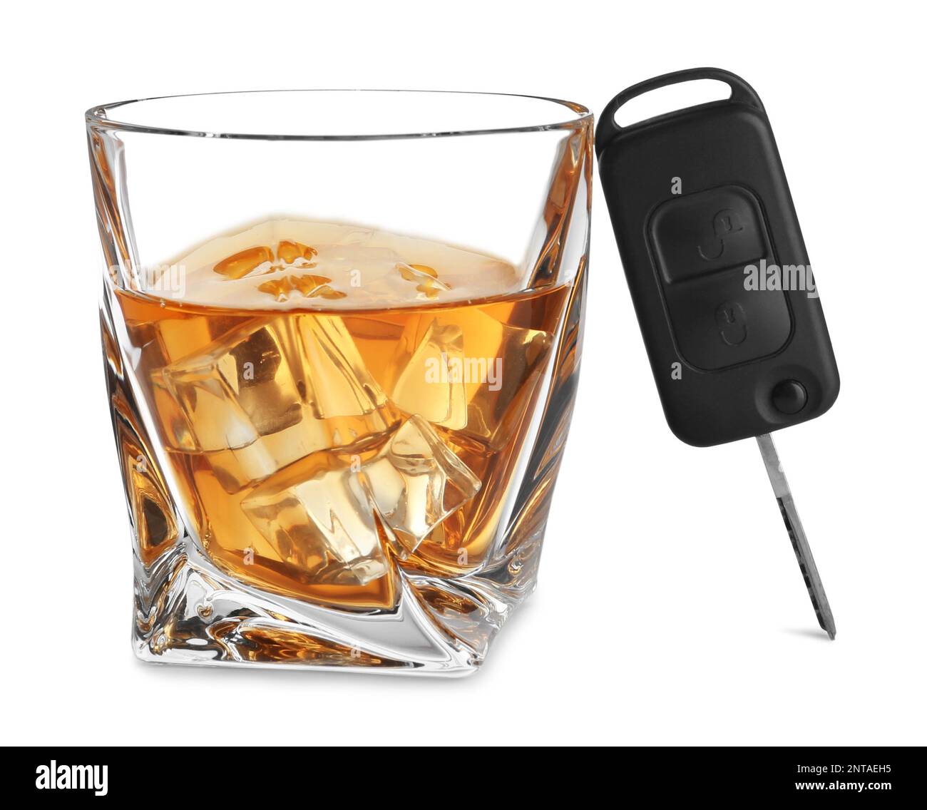 Glass of alcohol and car key isolated on white. Drunk driving concept ...