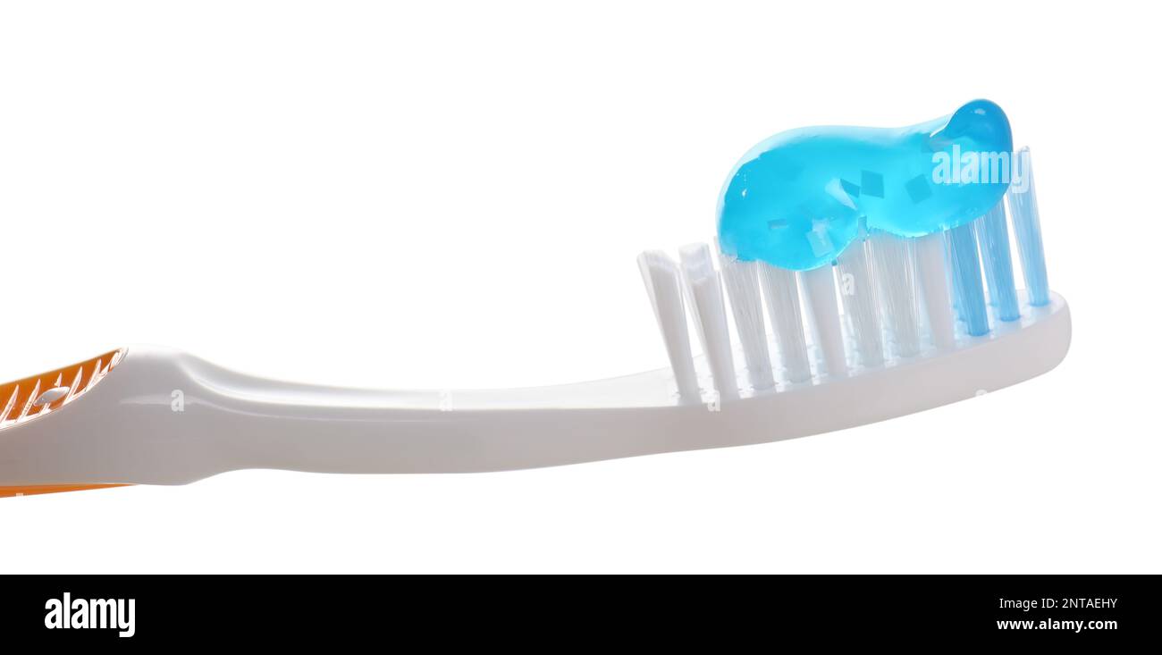Plastic brush with toothpaste isolated on white Stock Photo - Alamy