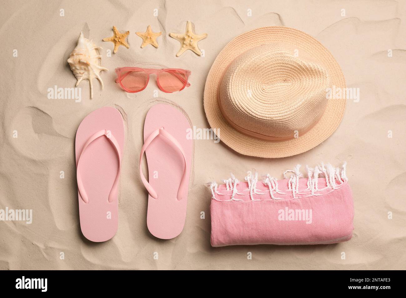 Flat lay composition with beach objects on sand Stock Photo - Alamy