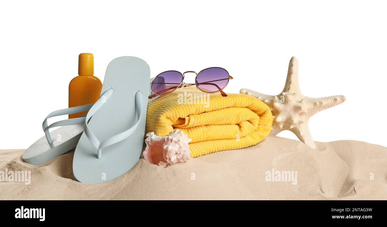Different beach objects on sand against white background Stock Photo ...