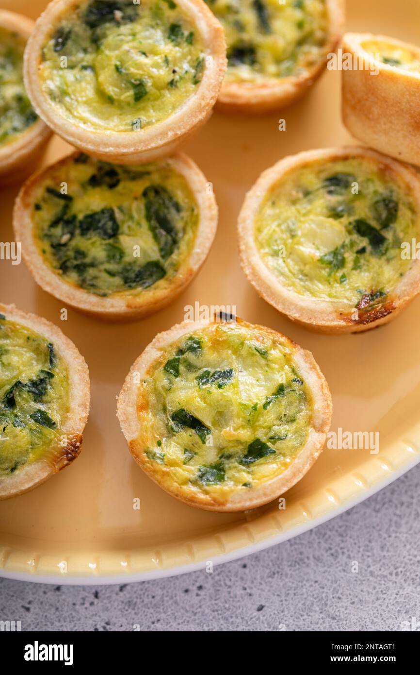 Mini quiches with spinach for Easter brunch, quiche florentine Stock ...