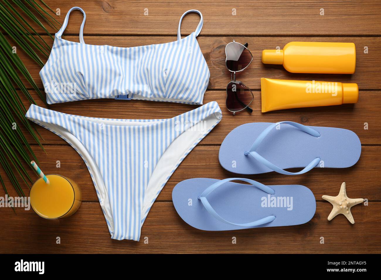 Flat lay composition with beach objects on wooden background Stock ...