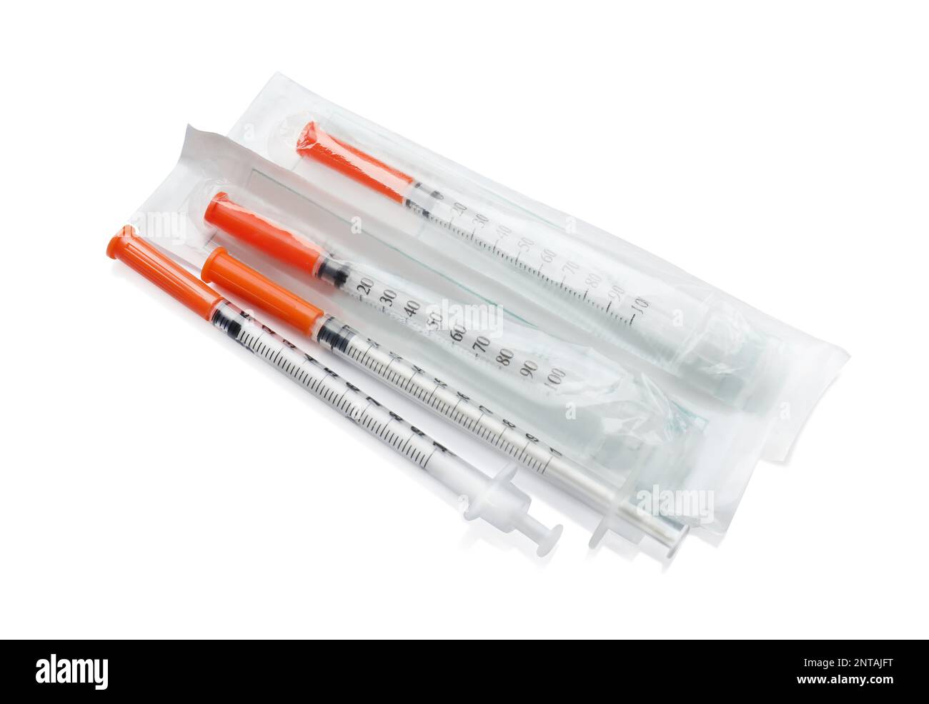 Disposable syringes on white background. Medical equipment Stock Photo ...