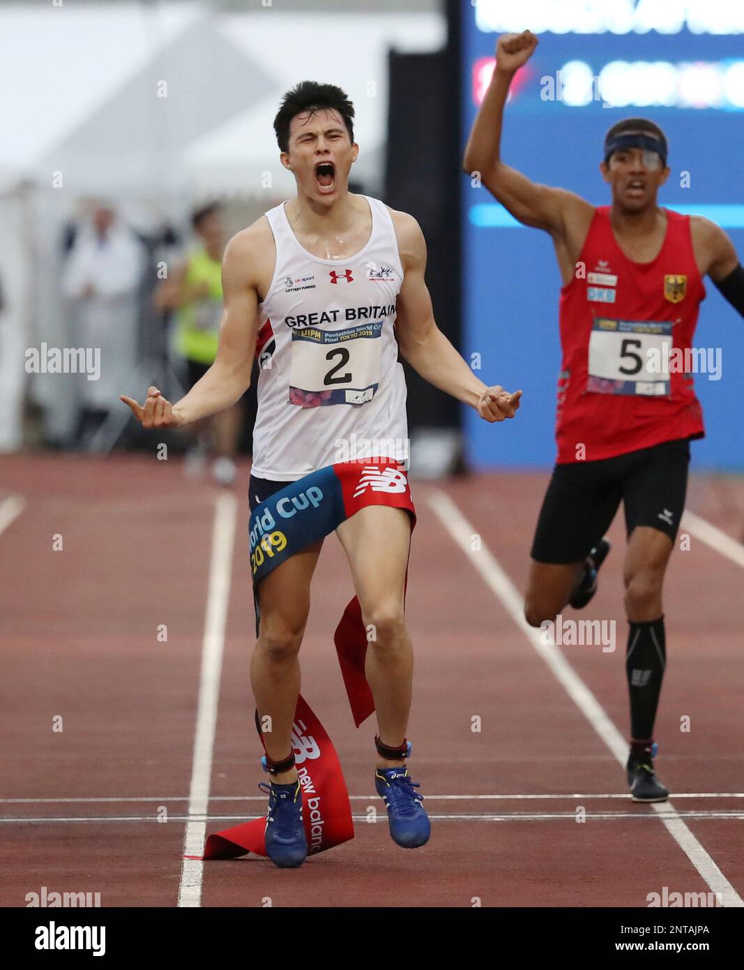 JOSEPH CHOONG OF UNITED KINGDOM crosses a finish line during Laser-Run ...