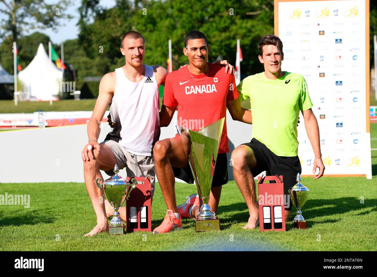 Pierce LePage (CAN), center, poses with runner-up Zach Ziemek (USA ...