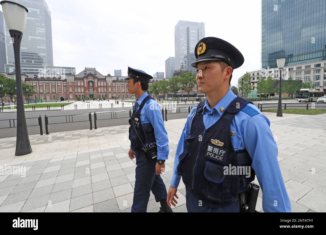 Riot police officers of the Tokyo Metropolitan Police Department patrol ...