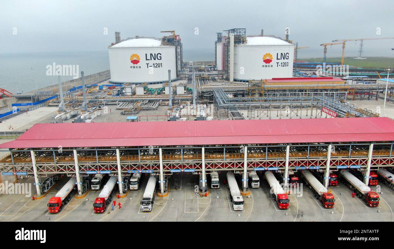 Tanker trucks work at the PetroChina's LNG reception terminal in Rudong ...