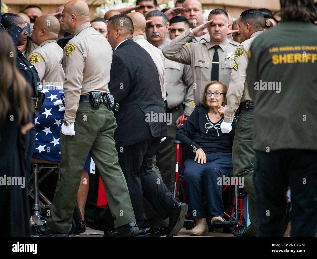 Los Angeles County Sheriff deputies carry Deputy Joseph Solano's casket ...