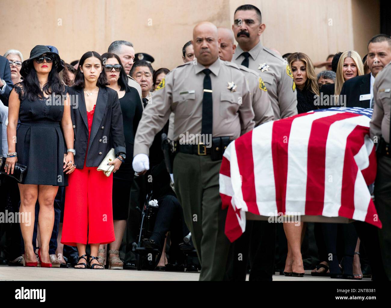 Los Angeles County Sheriff deputies carry Deputy Joseph Solano's casket ...