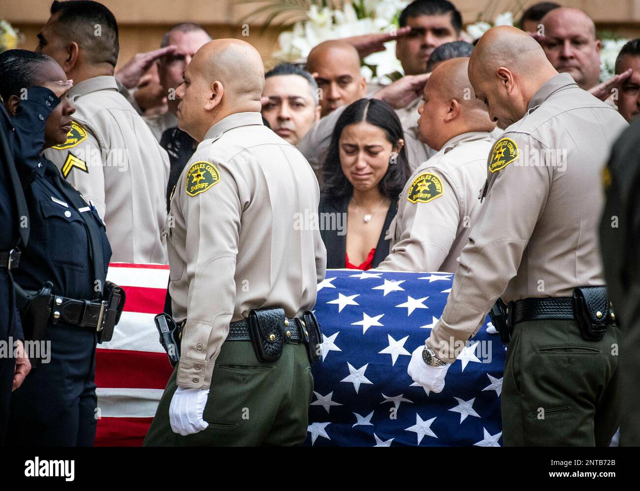 Los Angeles County Sheriff deputies carry Deputy Joseph Solano's casket ...