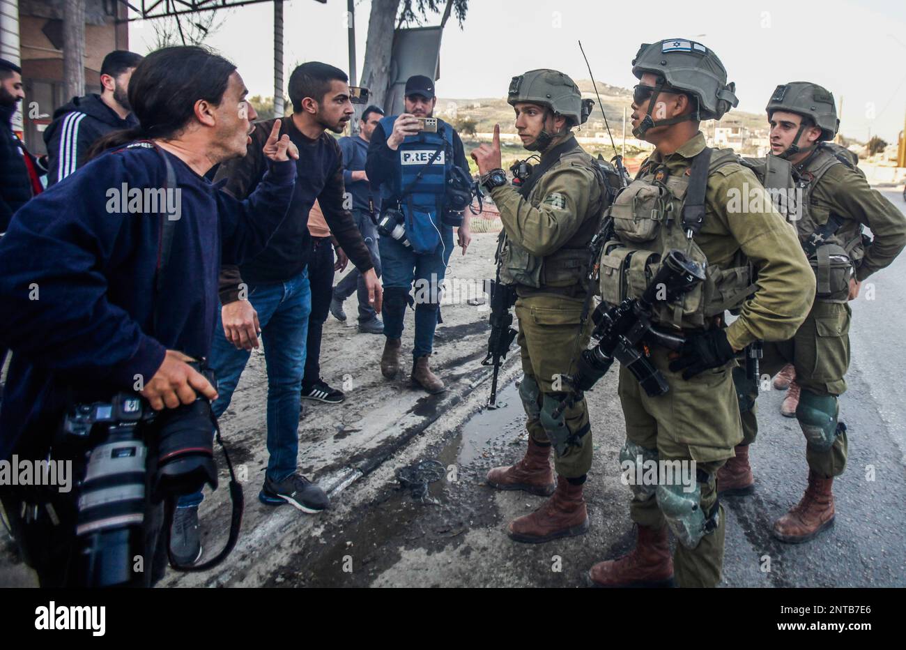 Nablus, Palestine. 27th Feb, 2023. Israeli soldiers separate the Jewish ...