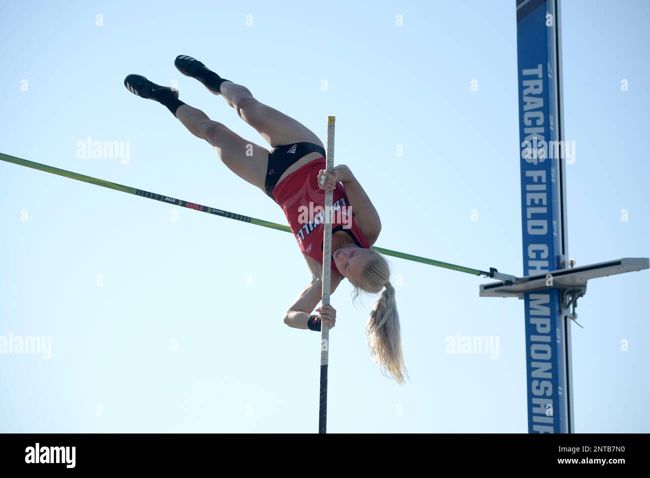 Louisville's Morgan Zacharias competes in the women's pole vault event ...