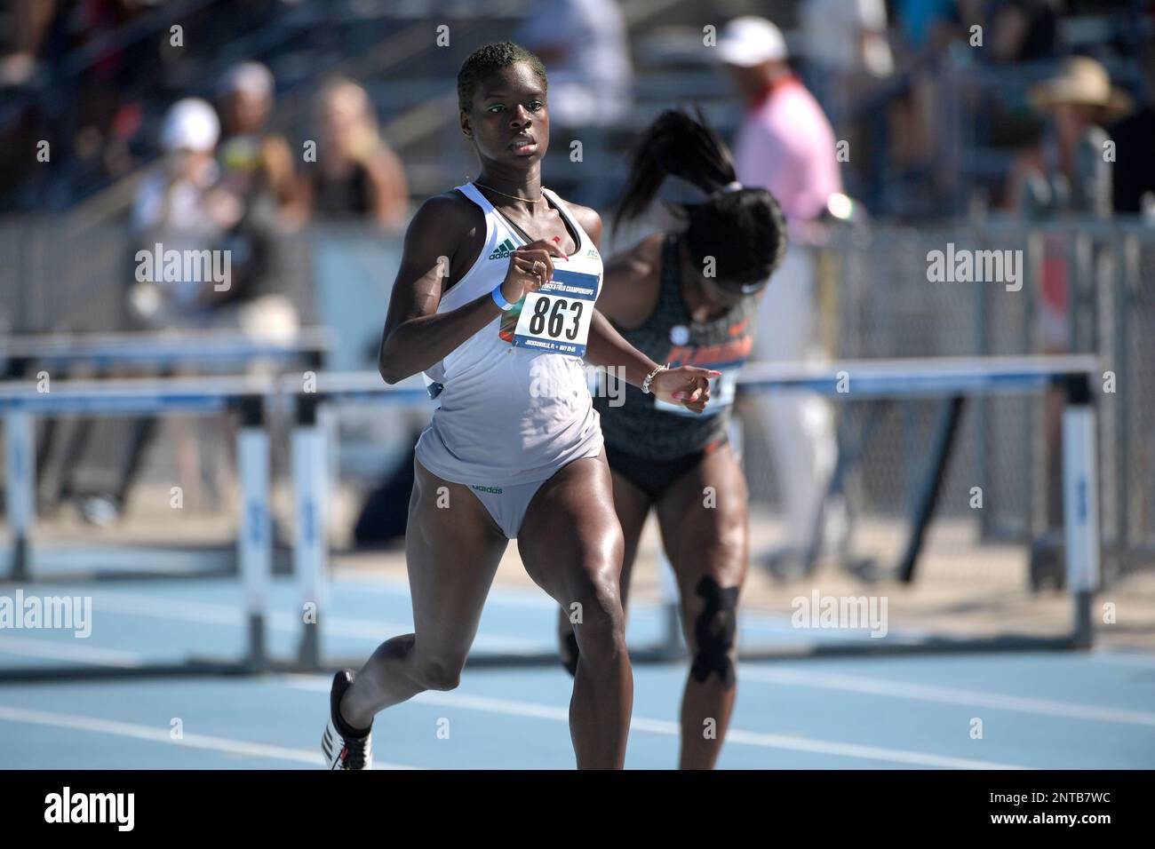 Miami's Tiara McMinn (863) and Florida's Timetria Mitchell (424 ...