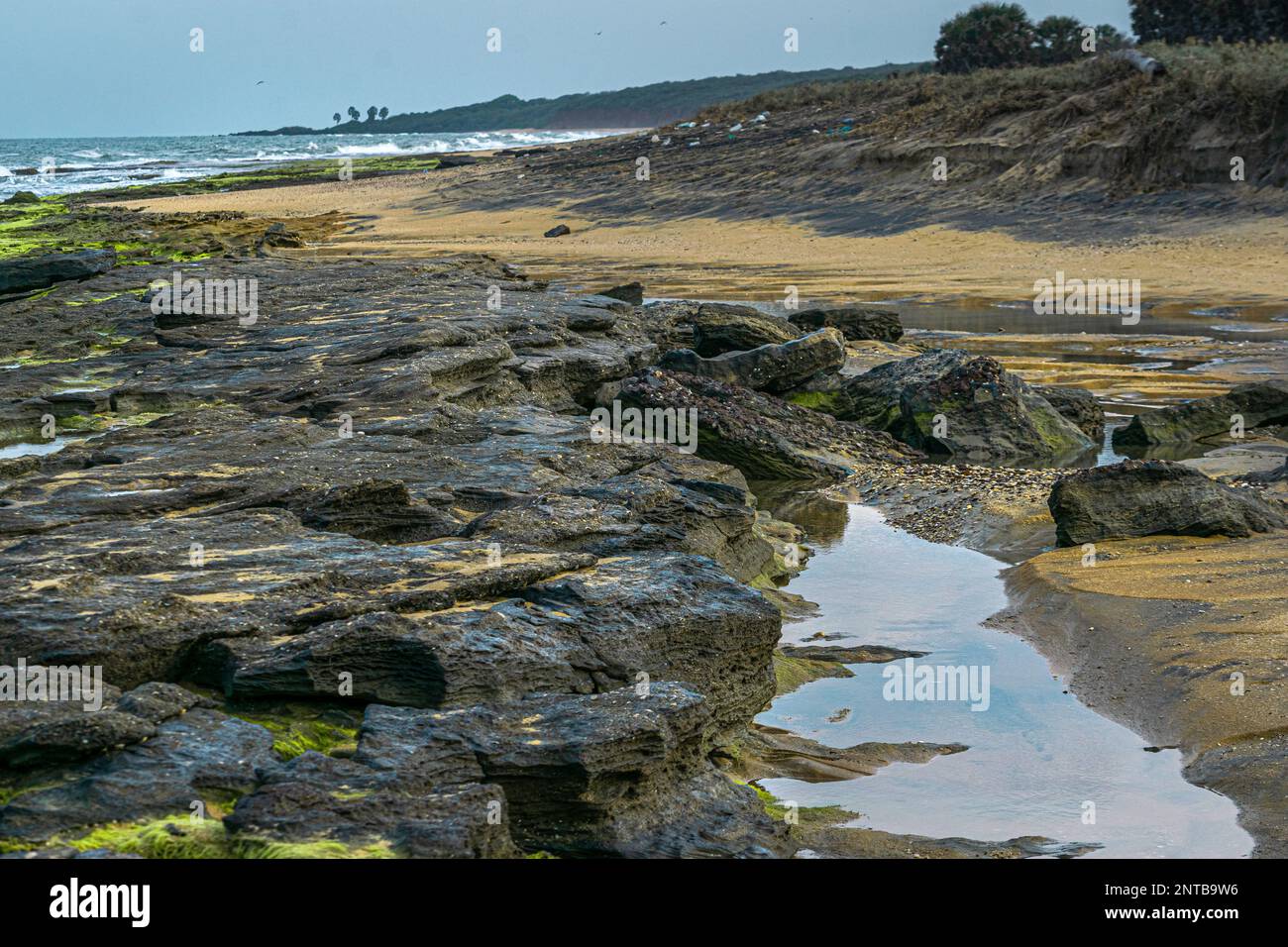beautiful seascape photograph, the photo foreground is black color ...