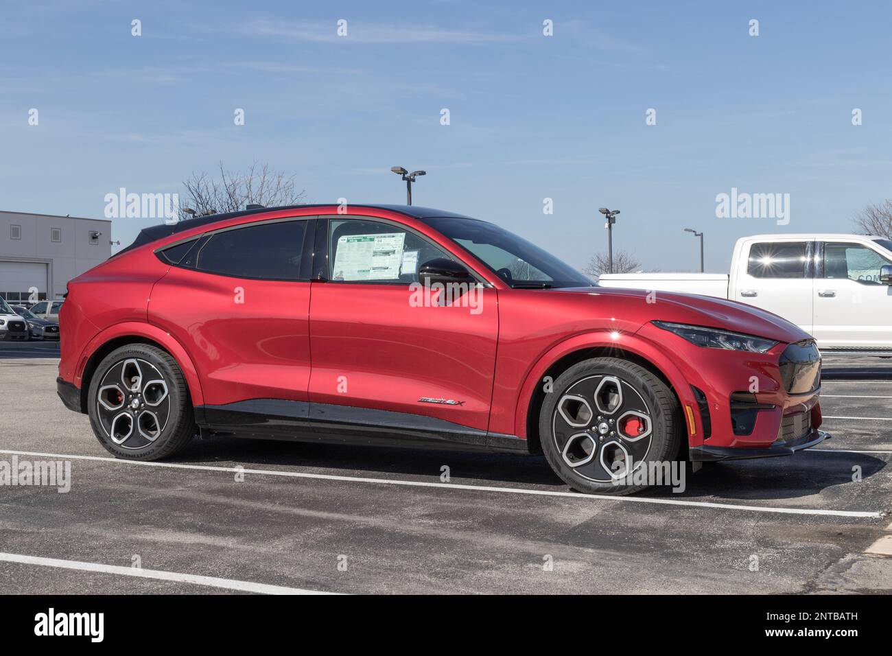 Fishers - Circa February 2023: Ford Mustang Mach-E SUV display. The ...