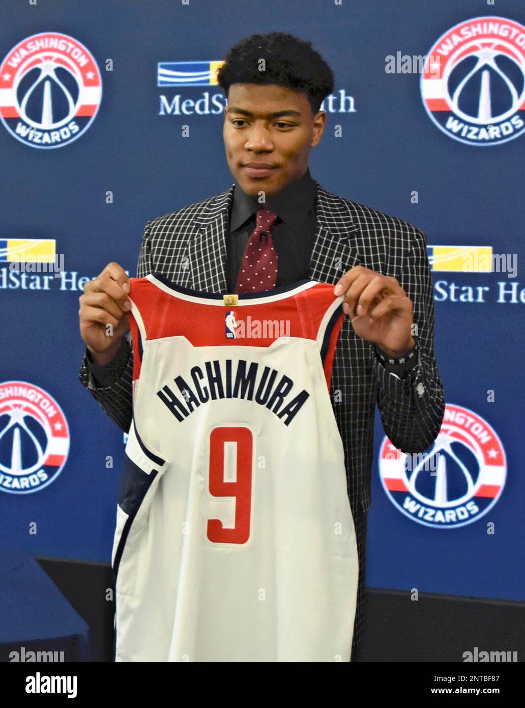 Rui Hachimura, Japanese basketball player, holding his uniform poses ...