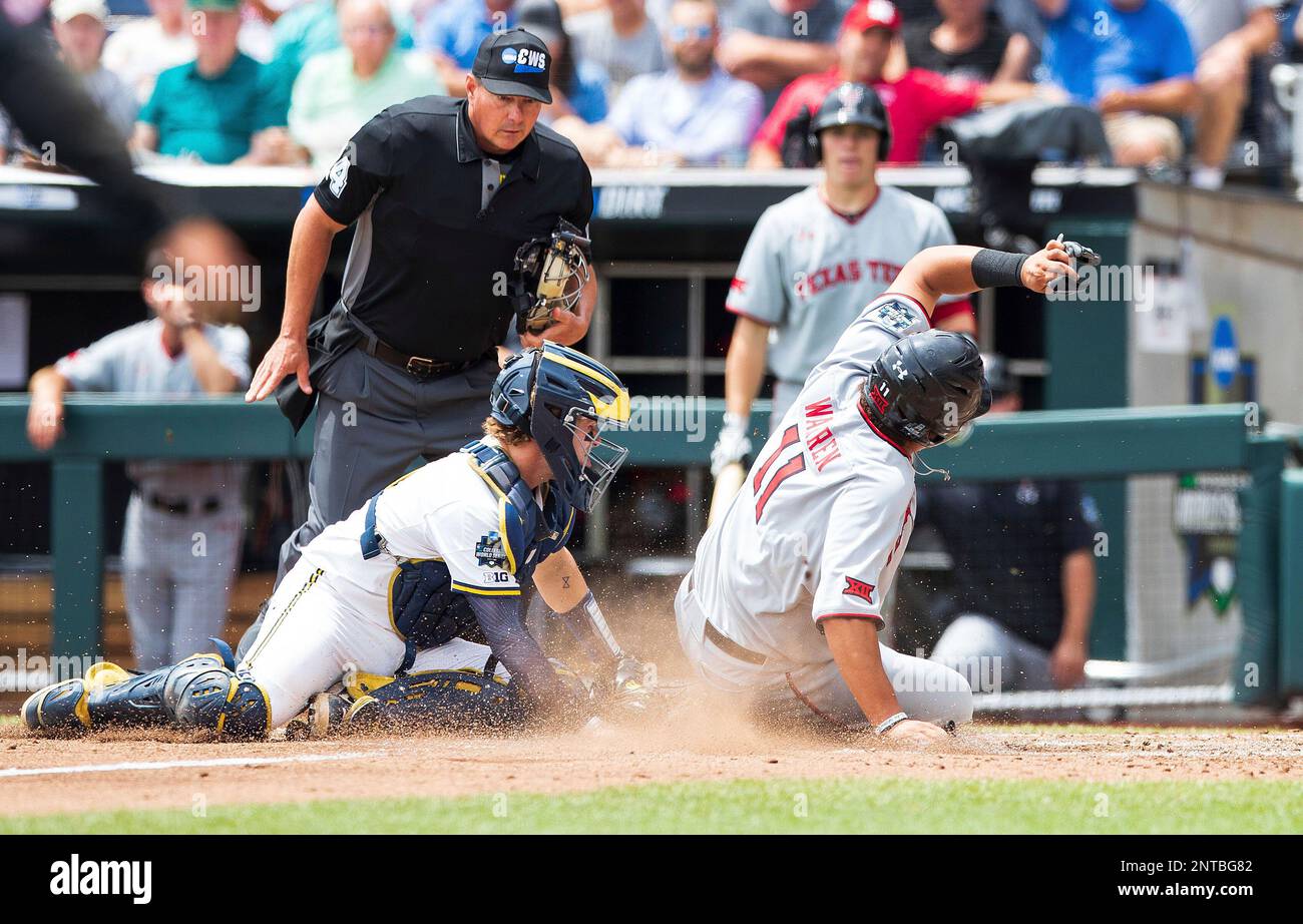 Texas Tech's Cameron Warren scores past Michigan's Joe Donovan during ...