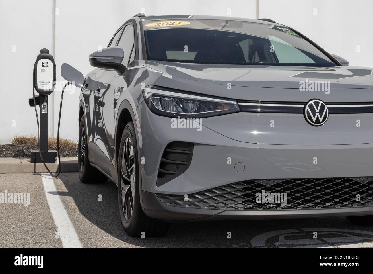 Noblesville - Circa February 2023: Volkswagen ID.4 SUV Electric Vehicle EV display. A DC fast ...