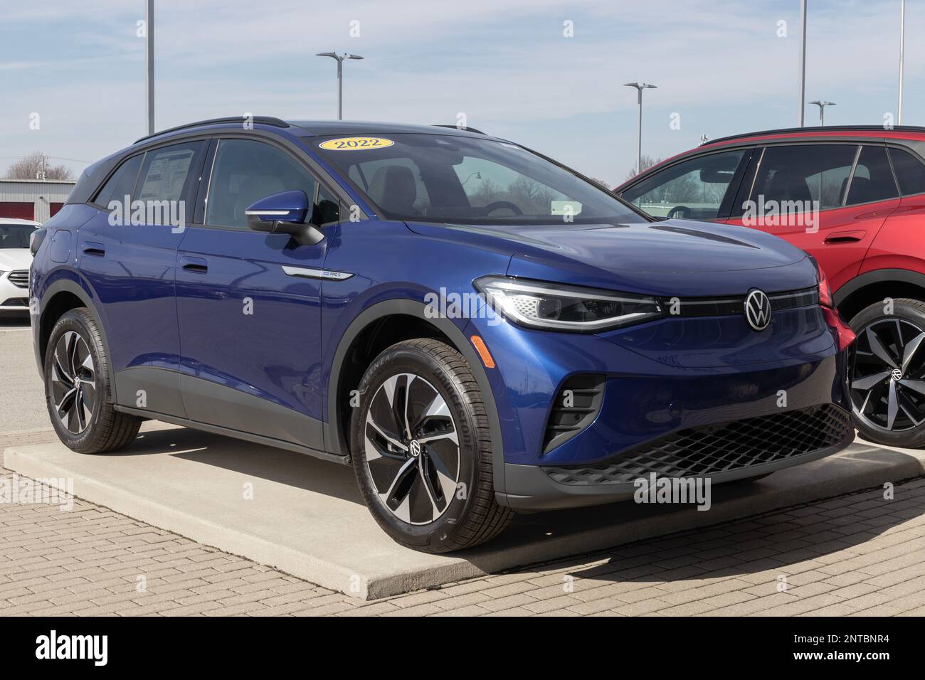 Noblesville - Circa February 2023: Volkswagen ID.4 SUV Electric Vehicle EV display. A DC fast ...