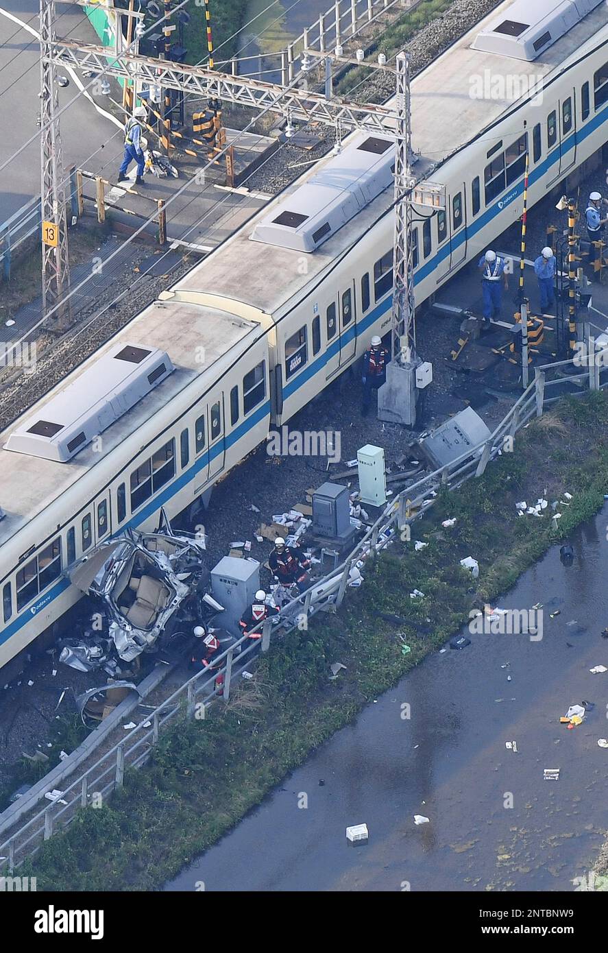 An aerial photo shows an electric train on the Odakyu Odawara line ...