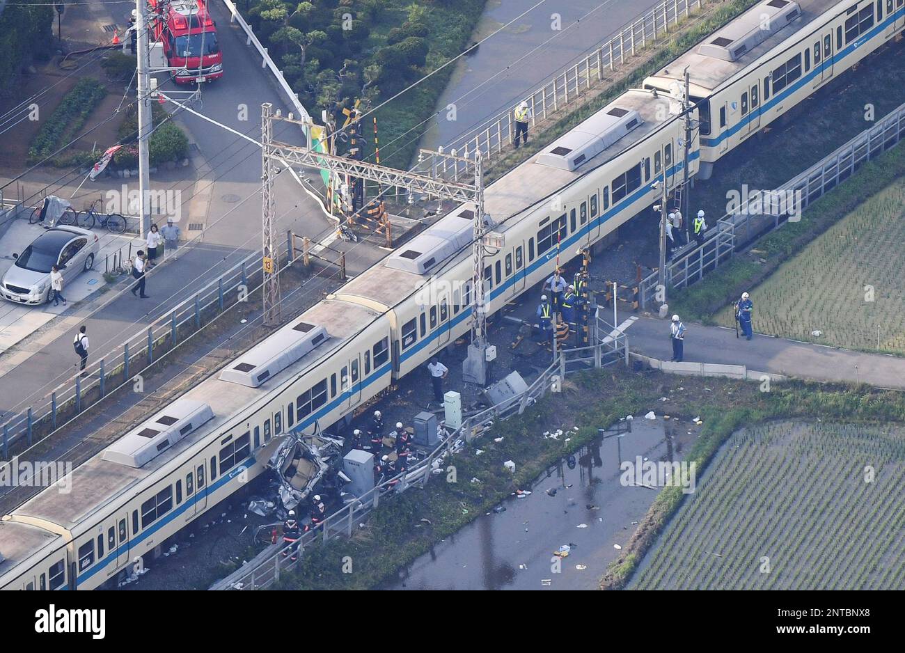 An aerial photo shows an electric train on the Odakyu Odawara line ...
