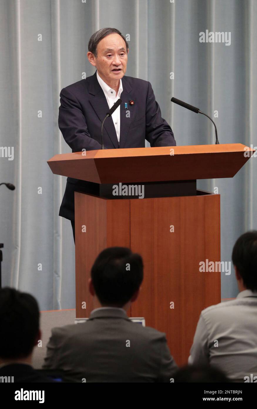 Chief Cabinet Secretary Yoshihide Suga speaks during a press conference ...